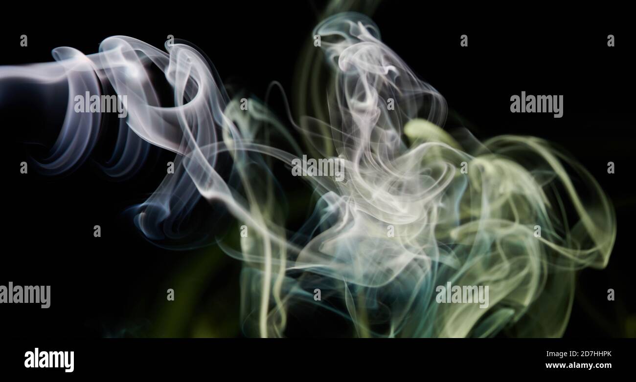 Purple swirl of smoke mist with smooth shape in black background Stock ...