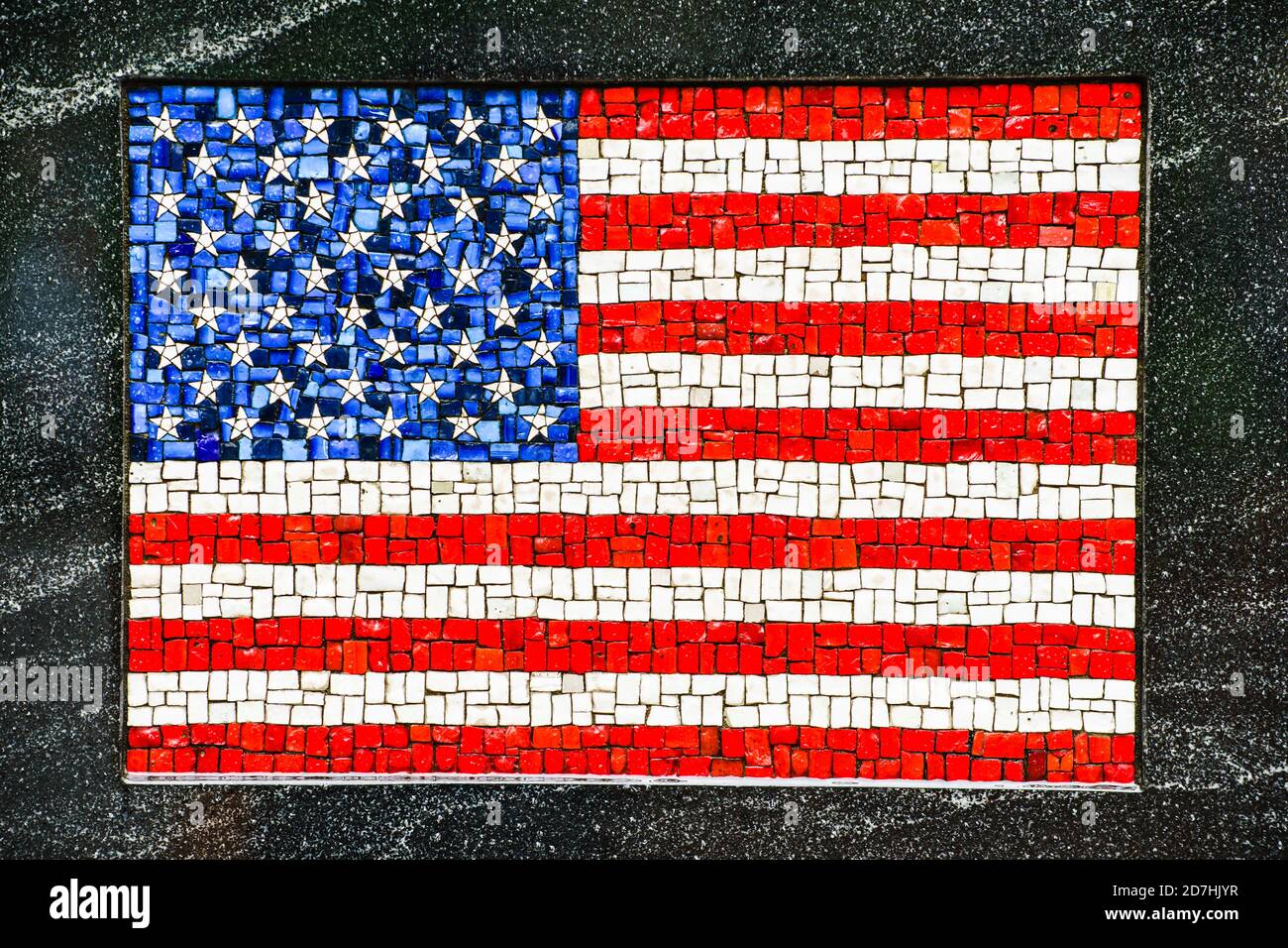 American flag made of little mosaic tiles on grey textured background ...