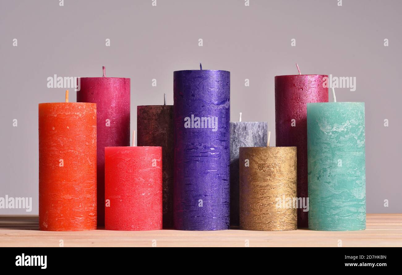 Set of multicolored new modern candles on gray background Stock Photo ...