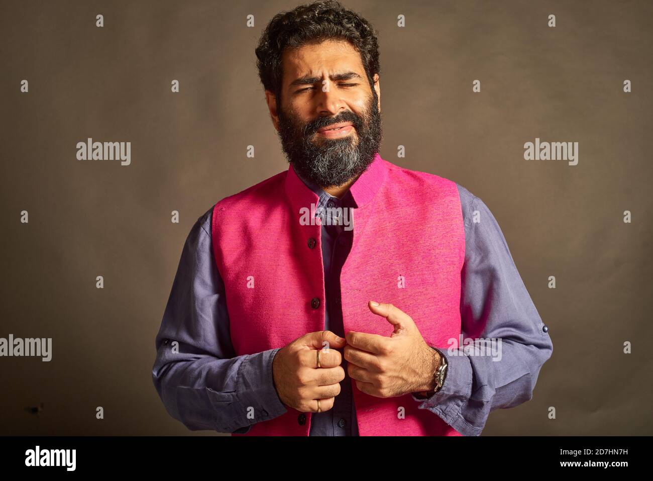 A young Indian man with a typical 'artist' and 'intellectual' look ...