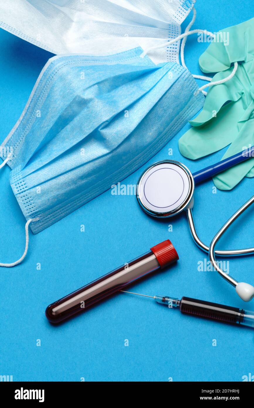 Top view of Medical equipment and tools on blue background ...