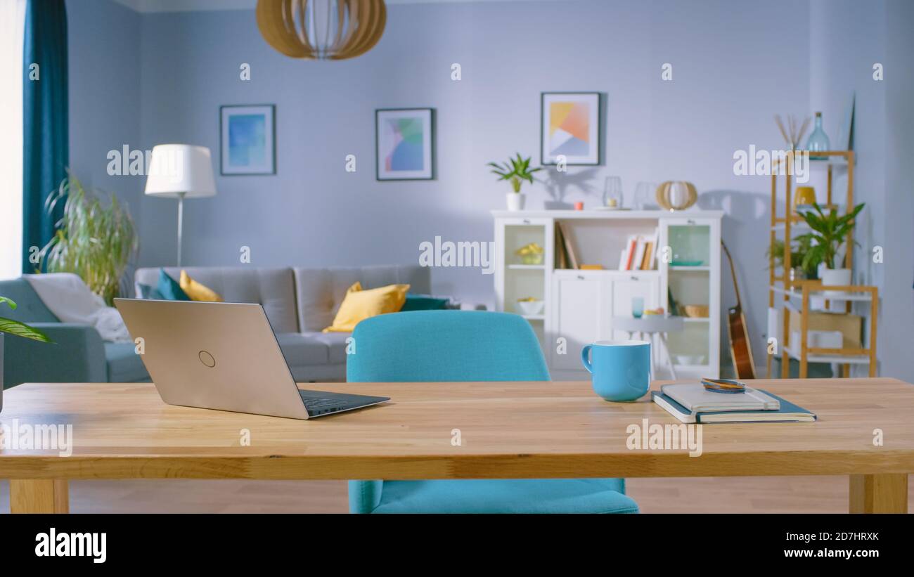 Stylish Interior of the Living Room with Wooden Working Desk with ...