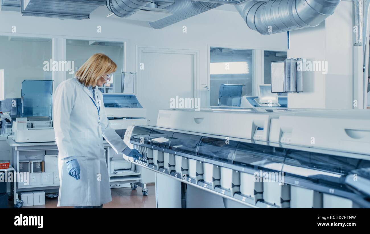 Medical biochemistry analyzer machine inspects hi-res stock photography ...