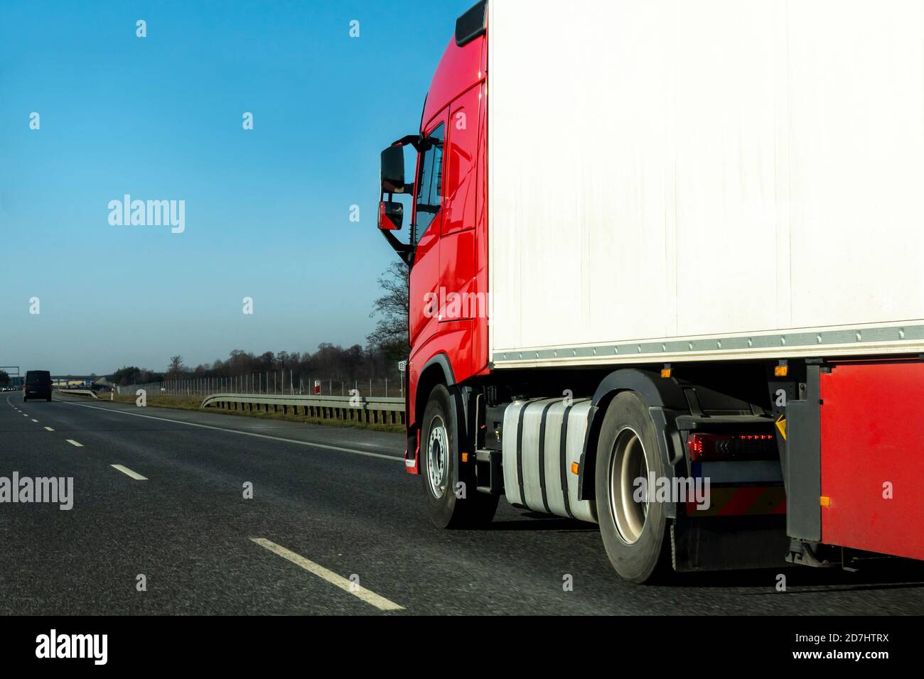 Long vehicle trailer truck on a highway Stock Photo - Alamy