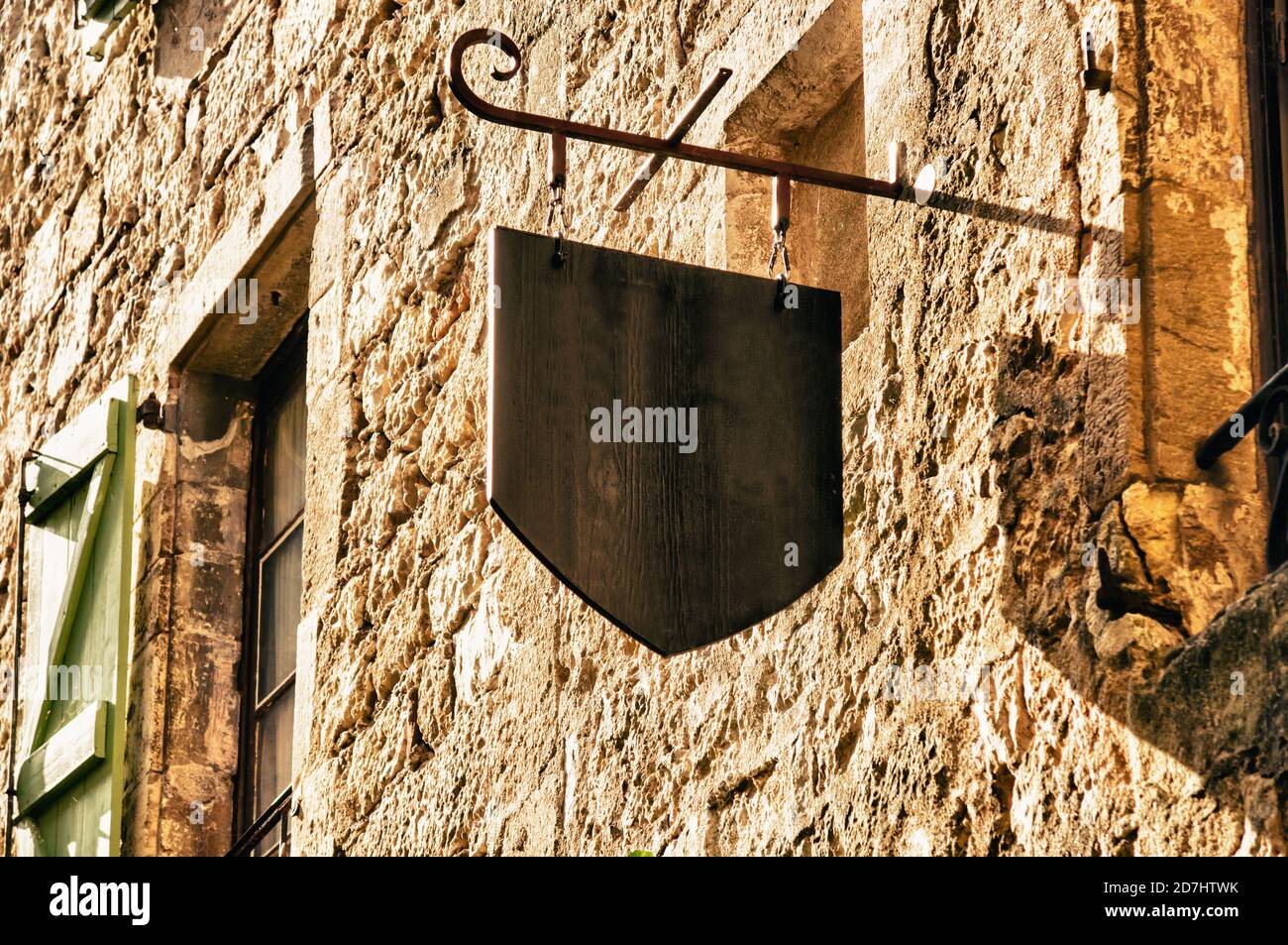 Hanging blank wooden sign on a historic castle wall Stock Photo - Alamy