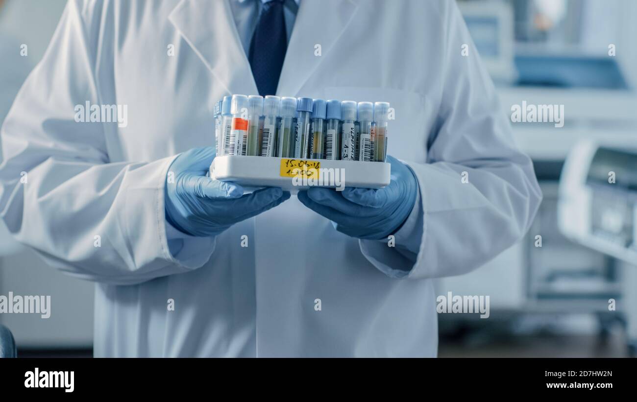 Test tubes filled with blood hi-res stock photography and images - Alamy