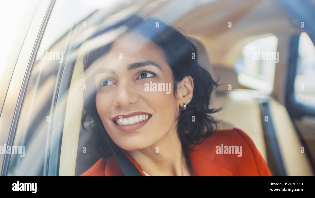 Beautiful Happy Woman Rides on a Passenger Seat of a Car, Looks in ...