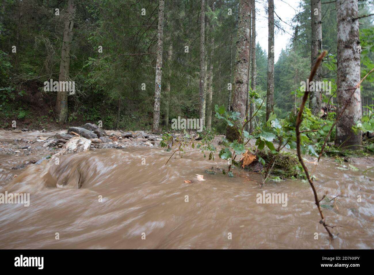 storm damage caused by mudslides, debris and mud after heavy rainfalls ...