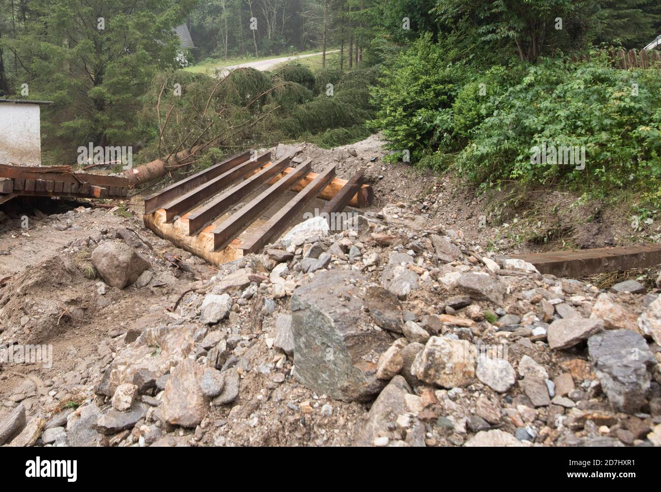 storm damage caused by mudslides, debris and mud after heavy rainfalls ...
