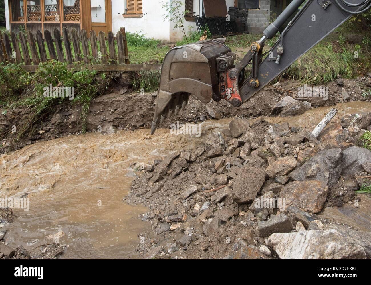 storm damage caused by mudslides, debris and mud after heavy rainfalls ...