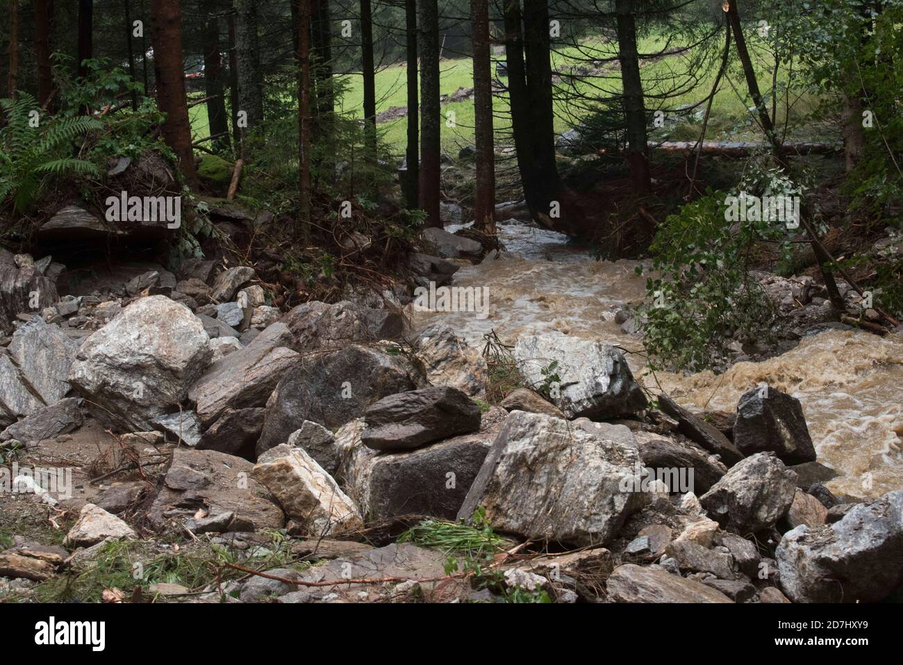 storm damage caused by mudslides, debris and mud after heavy rainfalls ...