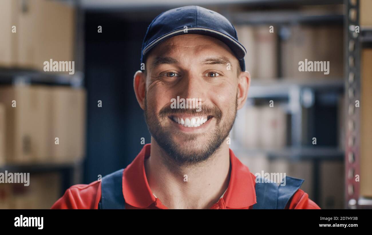 Portrait of Smiling Uniformed Worker. In the Background, Room with ...