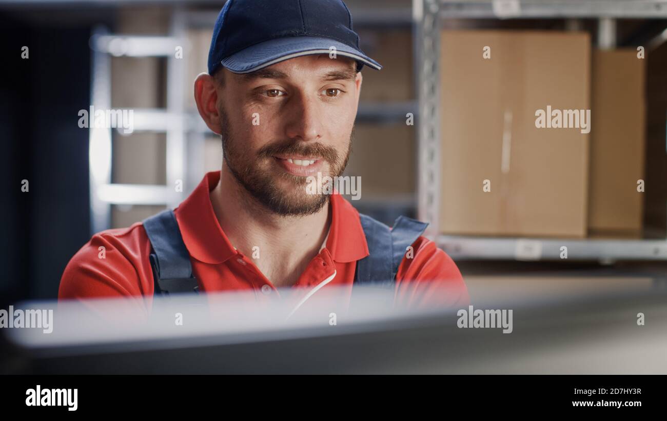 Close-up shot of Uniformed Worker Using Personal Computer while Sitting ...