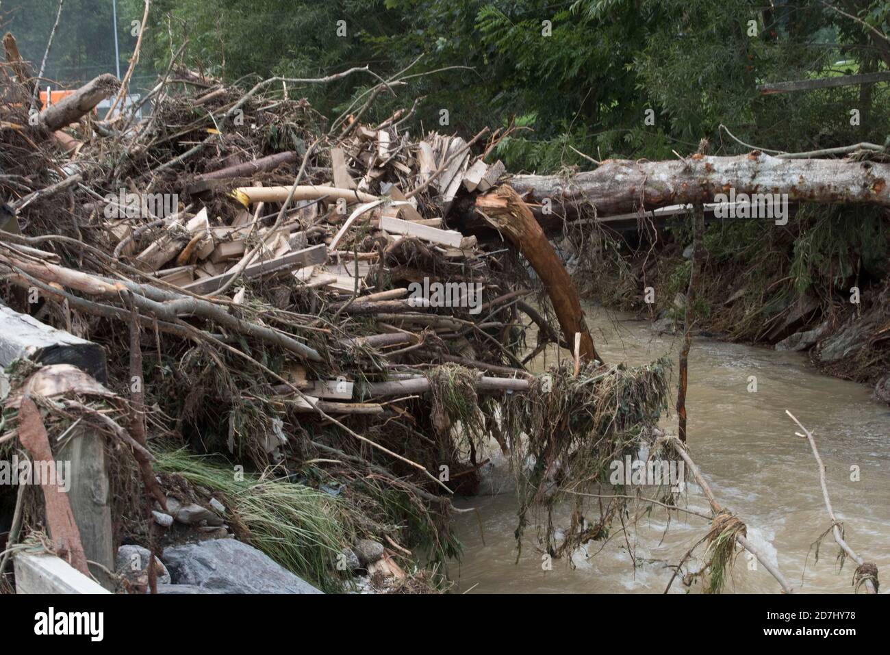 storm damage caused by mudslides, debris and mud after heavy rainfalls ...