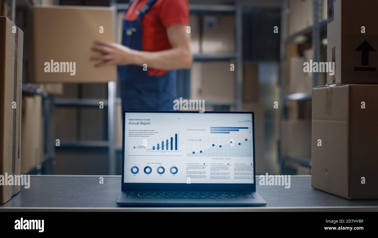 Laptop Screen with Infographics Displaying Graph and Statistics with ...