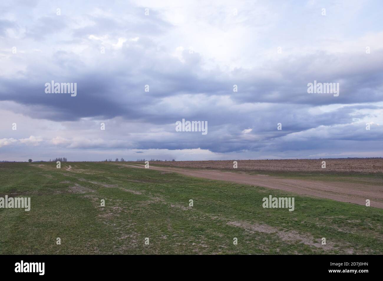 Dramatic pre-storm sky over the field. Spring landscape Stock Photo - Alamy