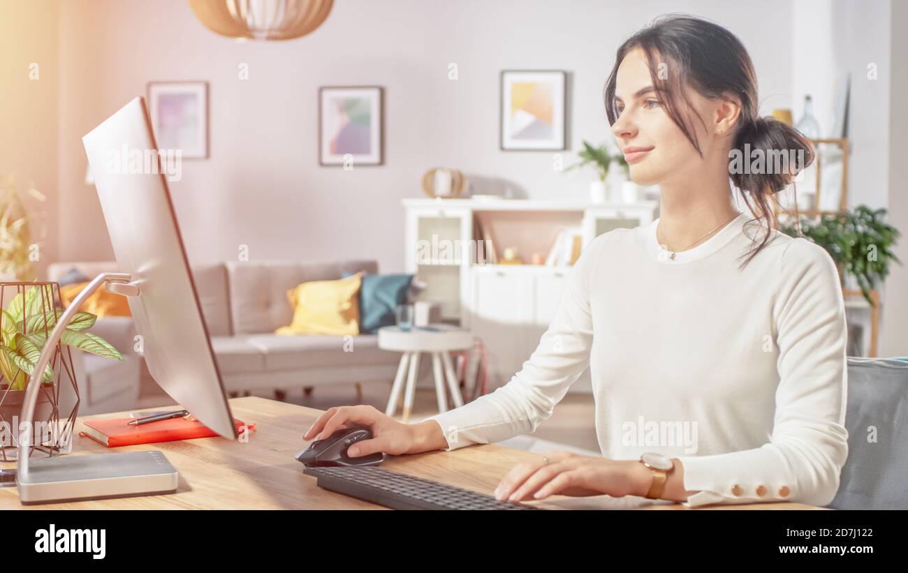 Portrait of the Beautiful Young Woman Working on Personal Computer from ...