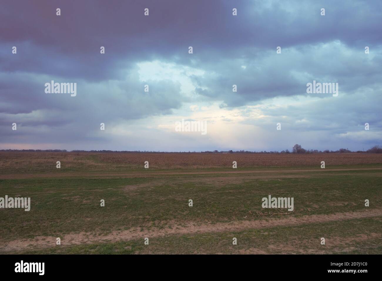 Dramatic pre-storm sky over the field. Spring landscape Stock Photo - Alamy