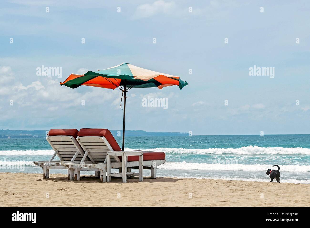 colorful parasol with sun chairs on tropical beach Stock Photo - Alamy