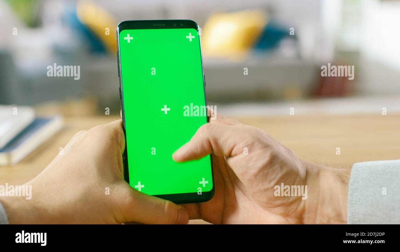 Man uses phone green screen hi-res stock photography and images - Alamy