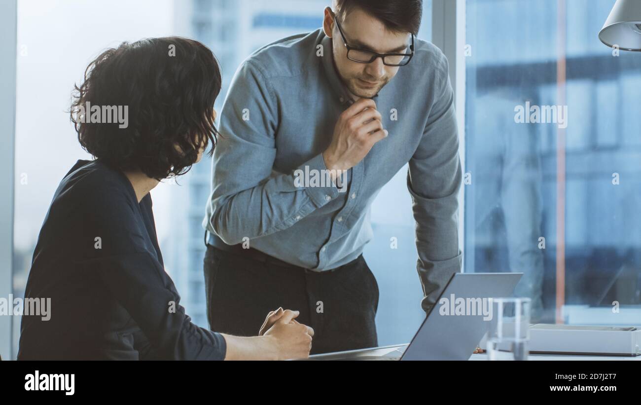 Businessman pointing modern building hi-res stock photography and ...