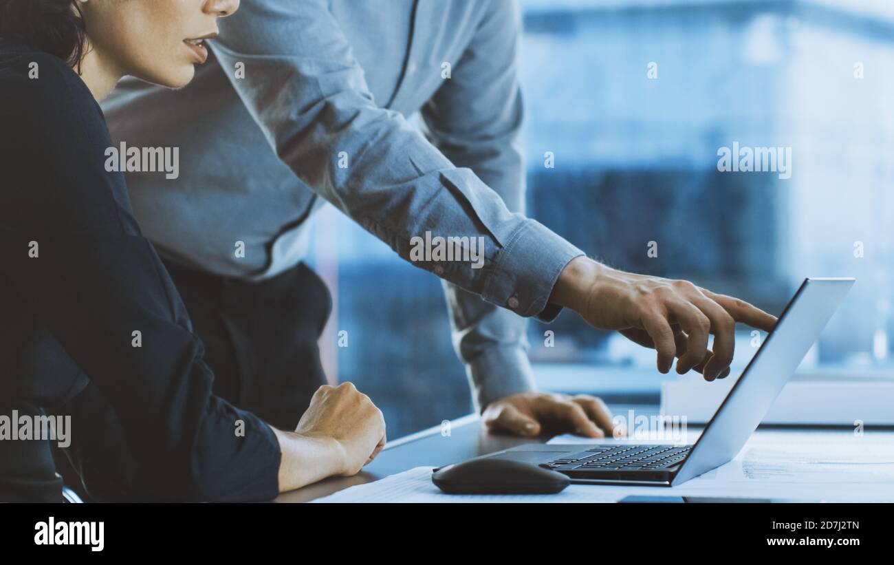 Businessman pointing modern building hi-res stock photography and ...