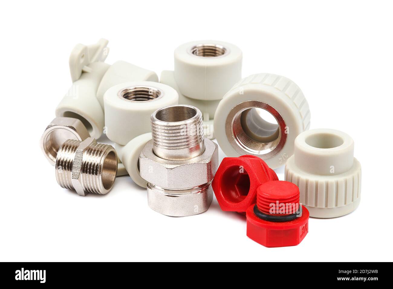 Set of metal-plastic plumbing couplings, adapters, plugs isolated on ...