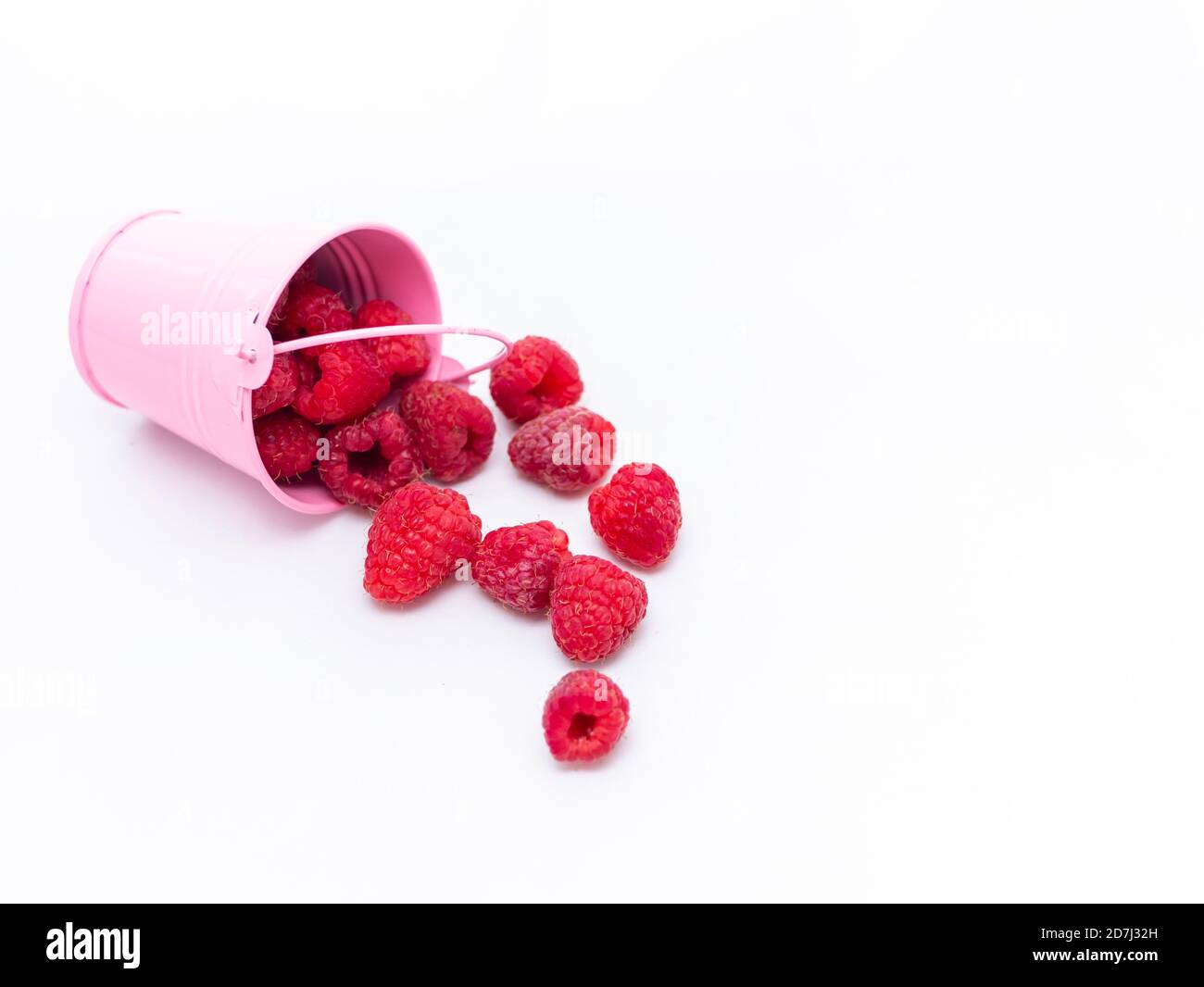 Bowl bucket red raspberries Cut Out Stock Images & Pictures - Alamy