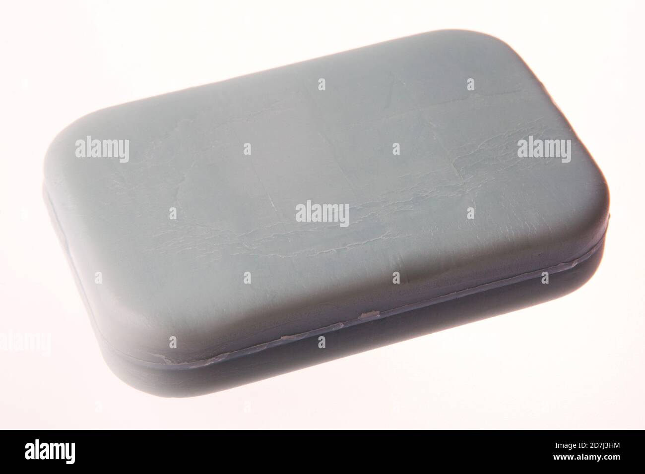 A bar of natural grey soap isolated on white background. Studio shot ...