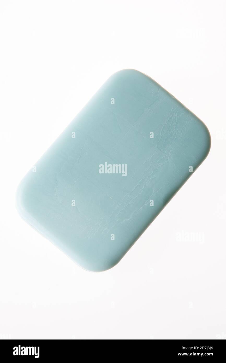 A bar of natural grey soap isolated on white background. Studio shot ...