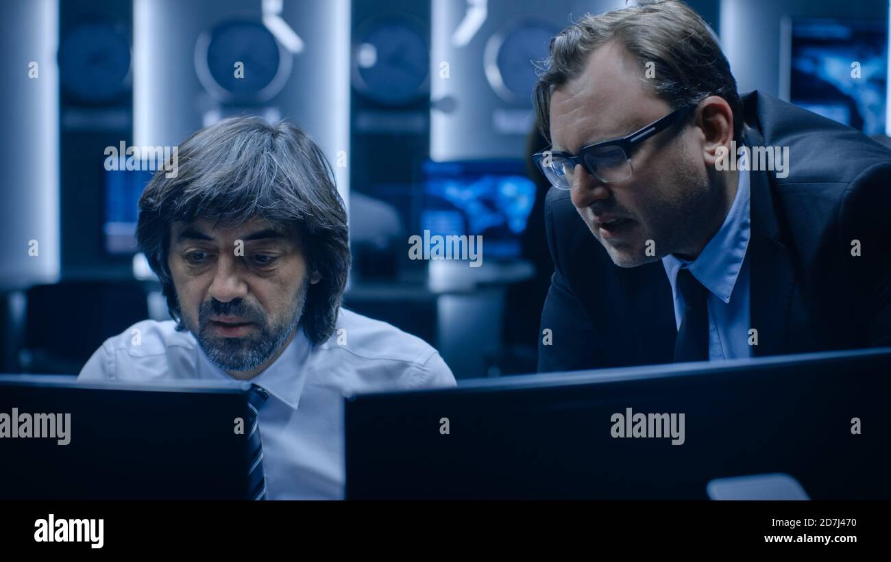 IT Professional Information Officer working on Personal Computer in ...