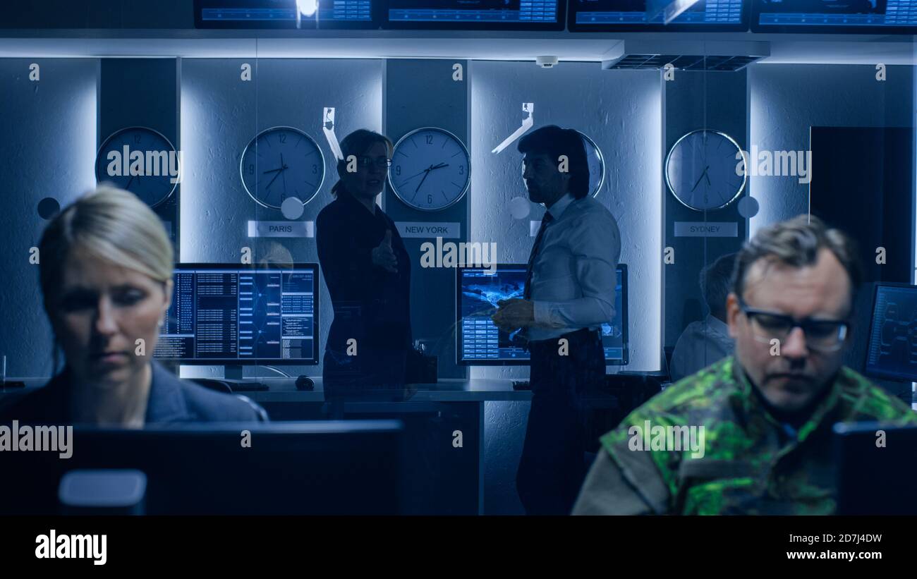 Government Cybersecurity Agency Professionals Working on Personal ...