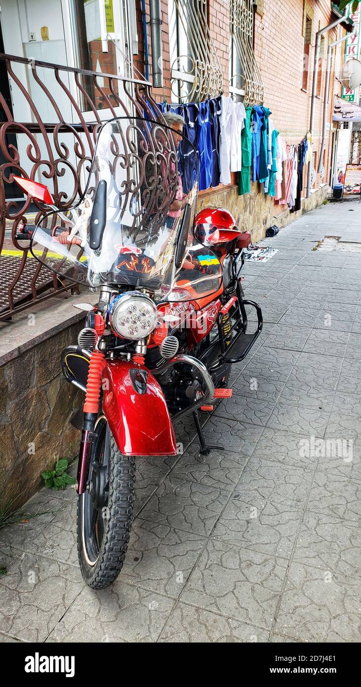 Old retro motorcycle clothing seller on the street Stock Photo - Alamy