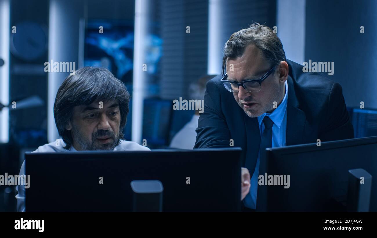 Government Chief of Cyber Security Consults Operations Officer who ...