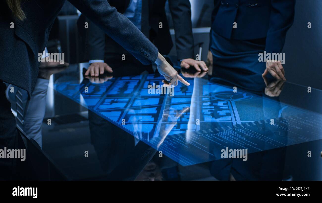 Diverse Team of Government Intelligence Agents Standing Around Digital ...