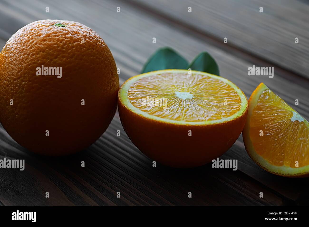 Orange citrus fruit on a stone table. Orange background Stock Photo - Alamy