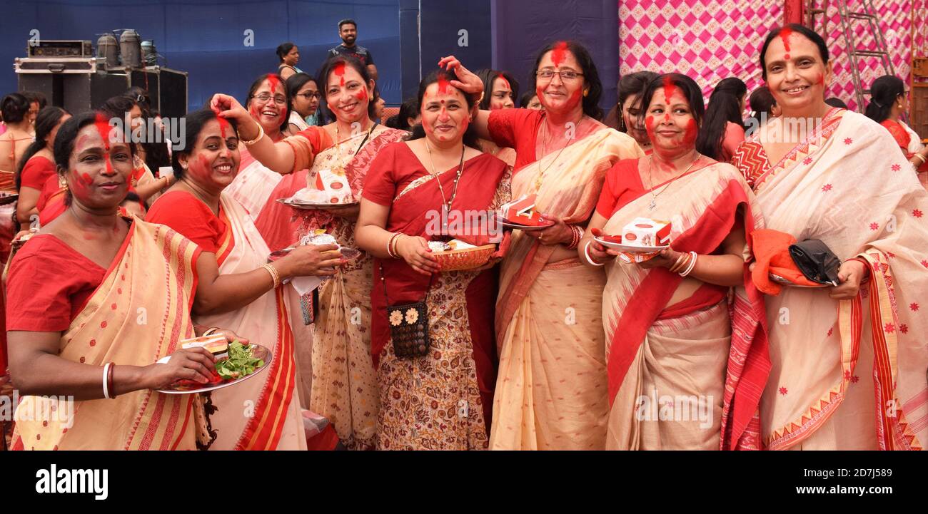 Indian Bengali women playing or applying Vermilion to each other during ...