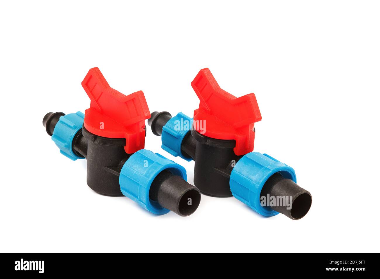 Plastic water taps isolated on white background Stock Photo - Alamy