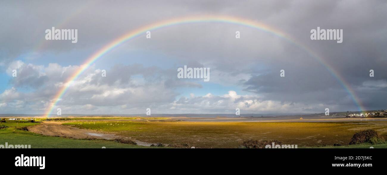 Rainbow over Northam Burrows, North Devon. Panorama Stock Photo - Alamy