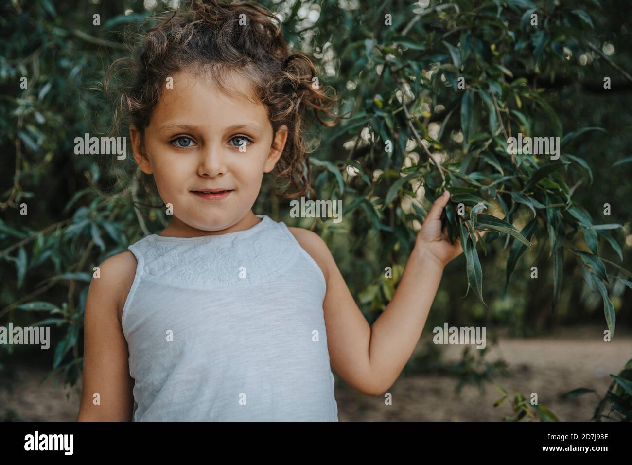 Girl standing under hi-res stock photography and images - Alamy