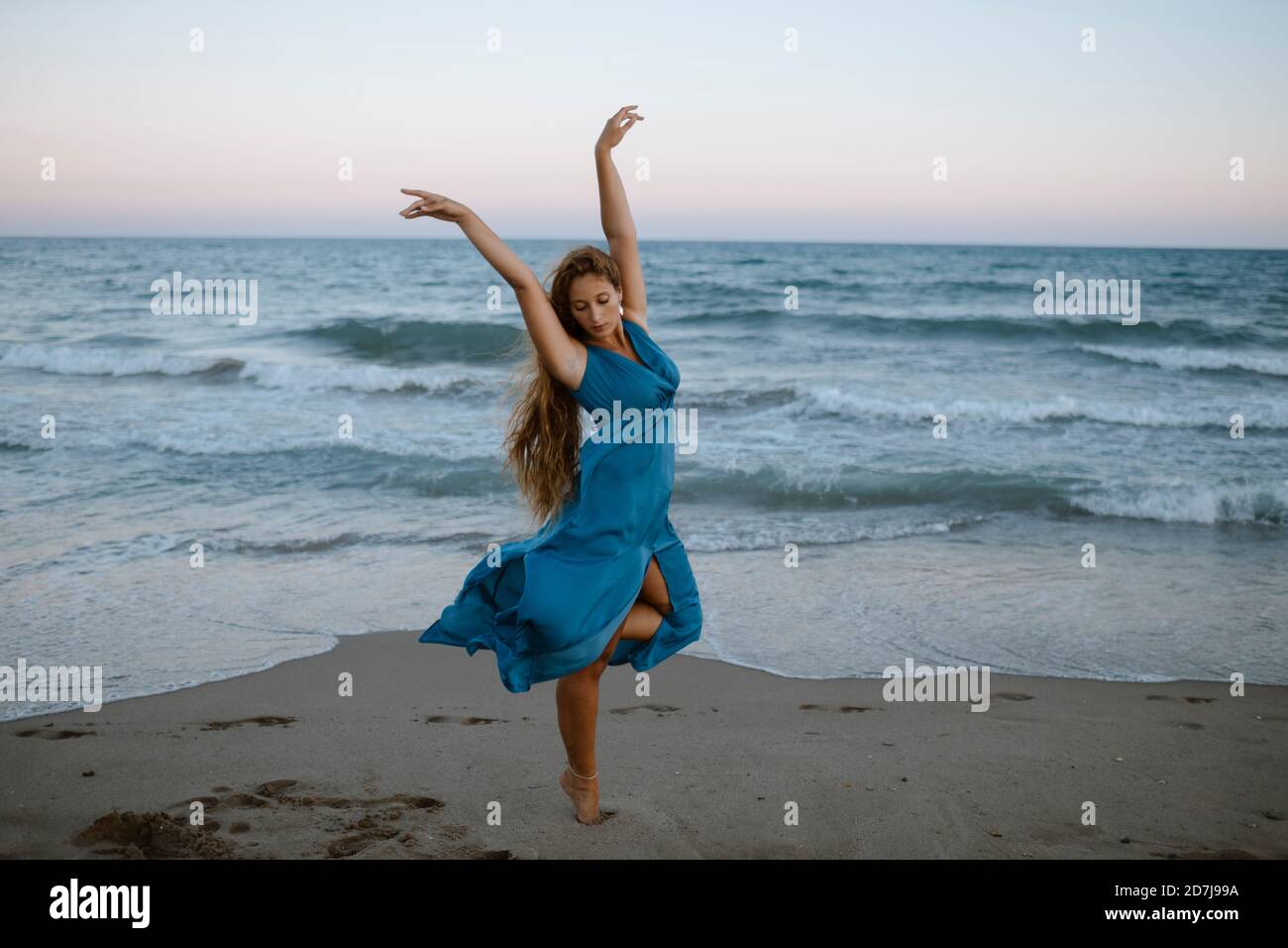 Woman dancing by the sea hi-res stock photography and images - Alamy