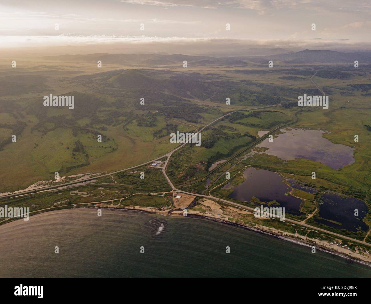 Russia, Primorsky Krai, Zarubino, Aerial view of coastal roads ...