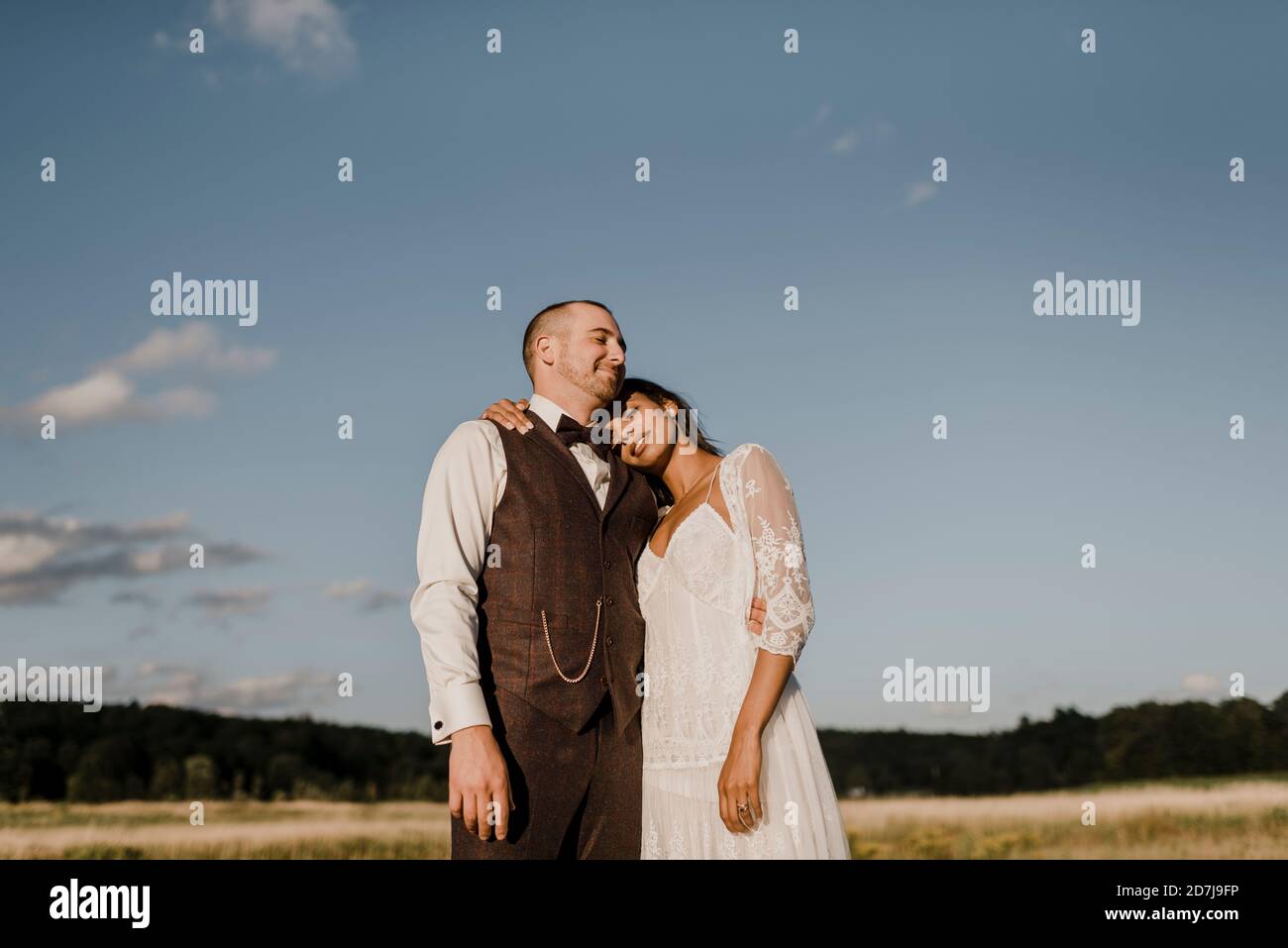 Bride leaning on shoulder hi-res stock photography and images - Alamy