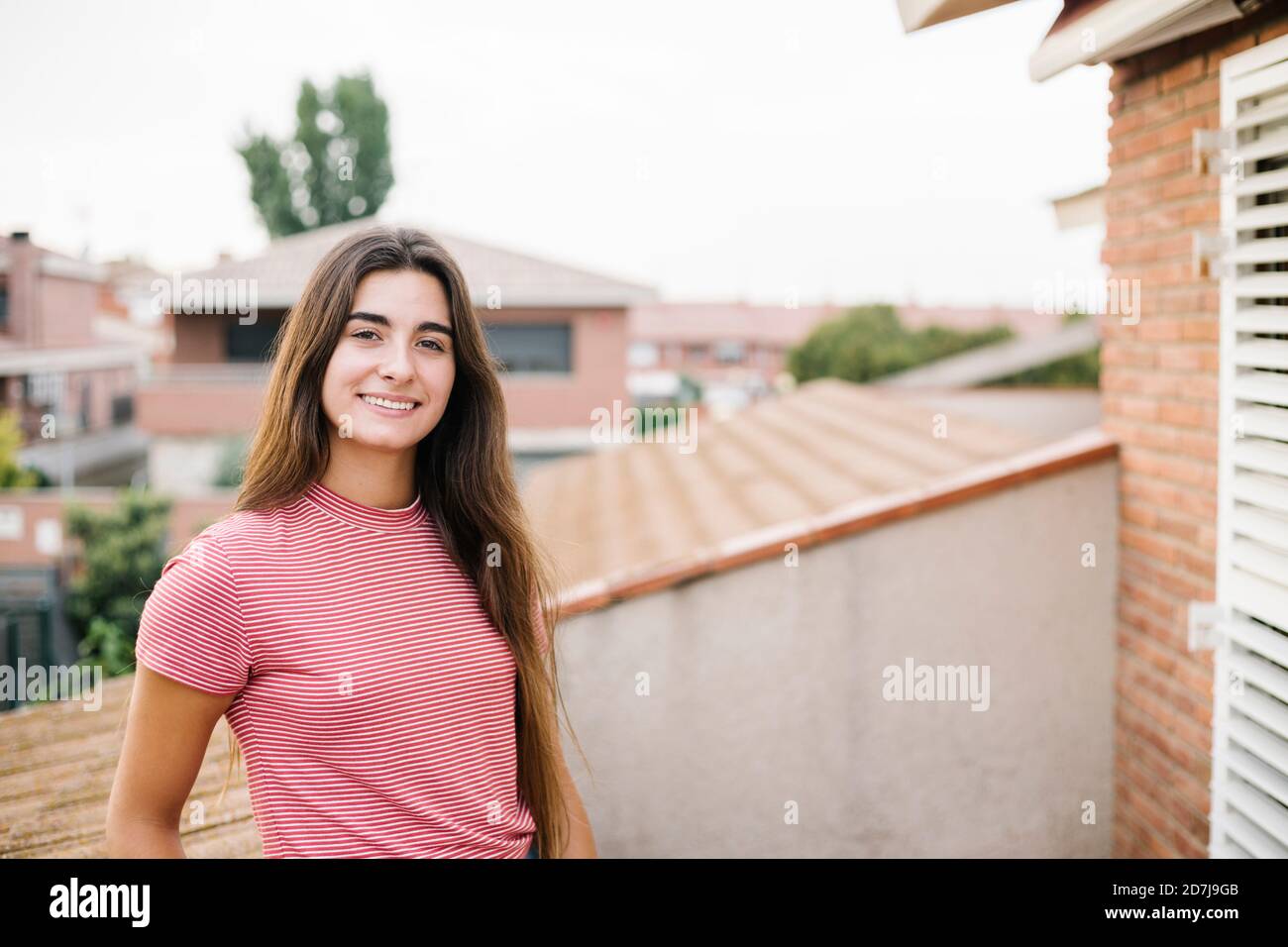 Beautiful women standing in balcony hi-res stock photography and images ...