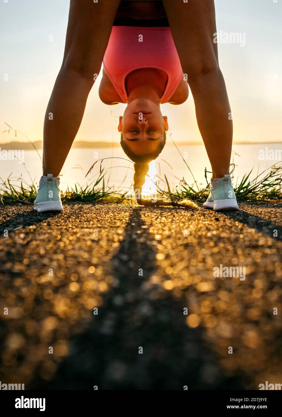 Bending over bending down hi-res stock photography and images - Alamy