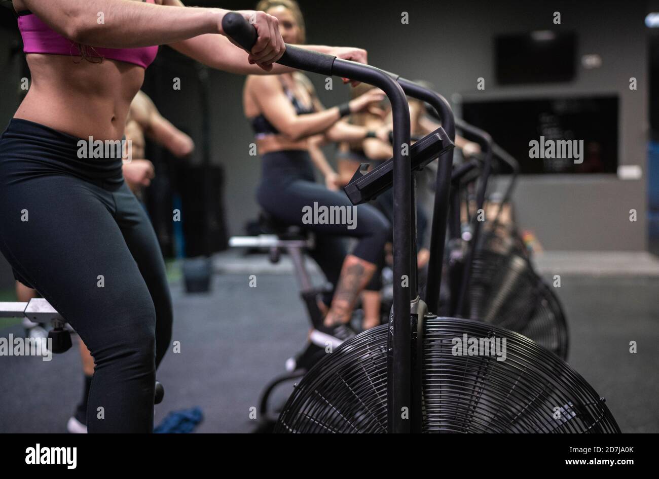 Women in gym bike hi-res stock photography and images - Alamy