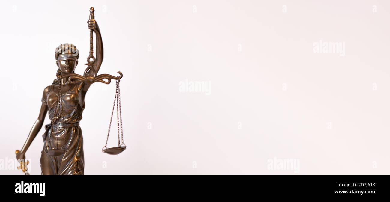 Close-up of a justice figure shines from sunlight Stock Photo - Alamy