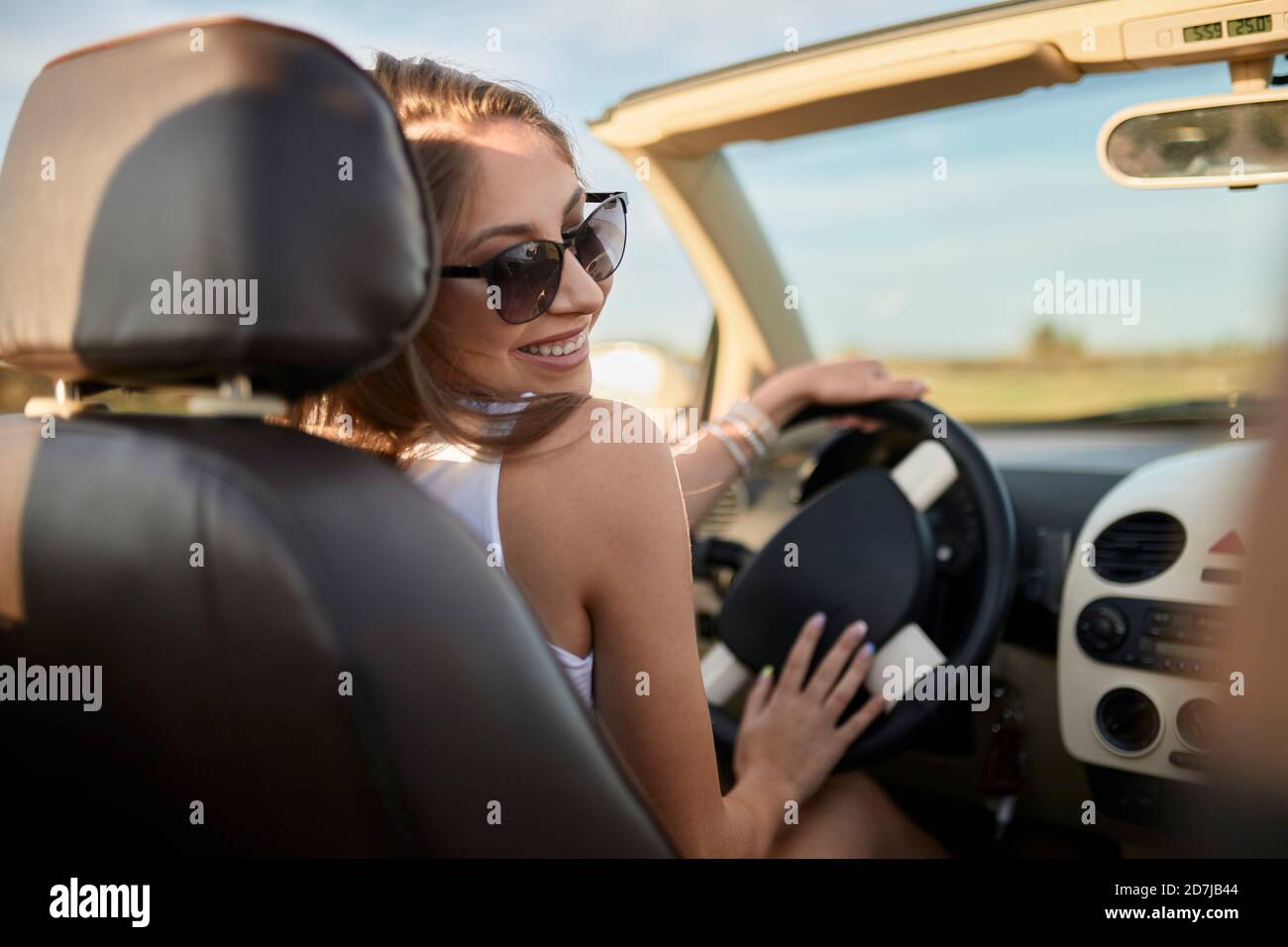 Side view woman driving convertible hi-res stock photography and images ...