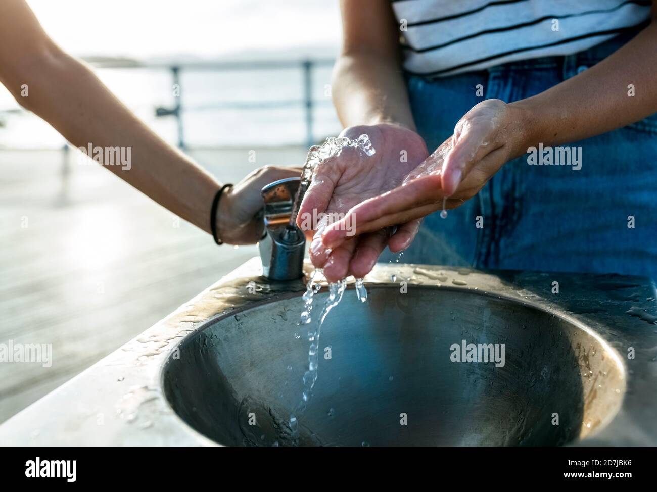 Woman washing hands hi-res stock photography and images - Alamy