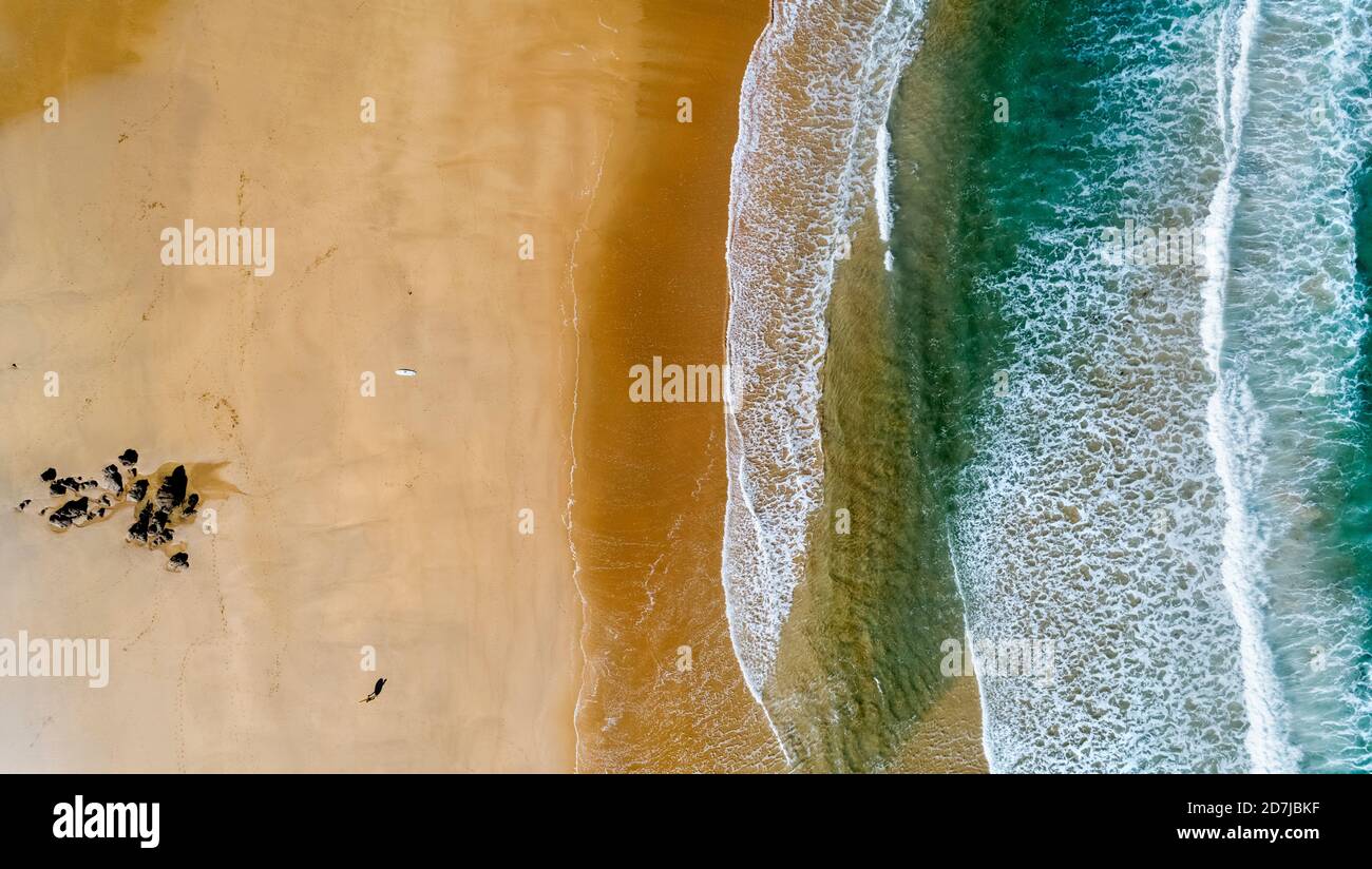 Aerial view of edge of sandy coastal beach Stock Photo - Alamy